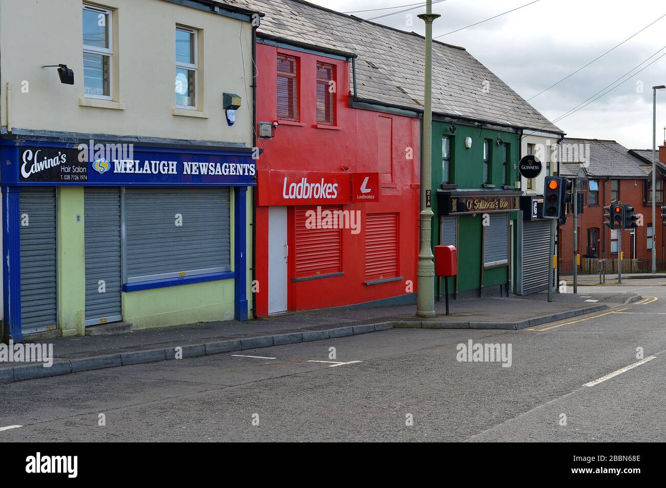 Shuttered business premises, due to Coronavirus and deserted street in ...