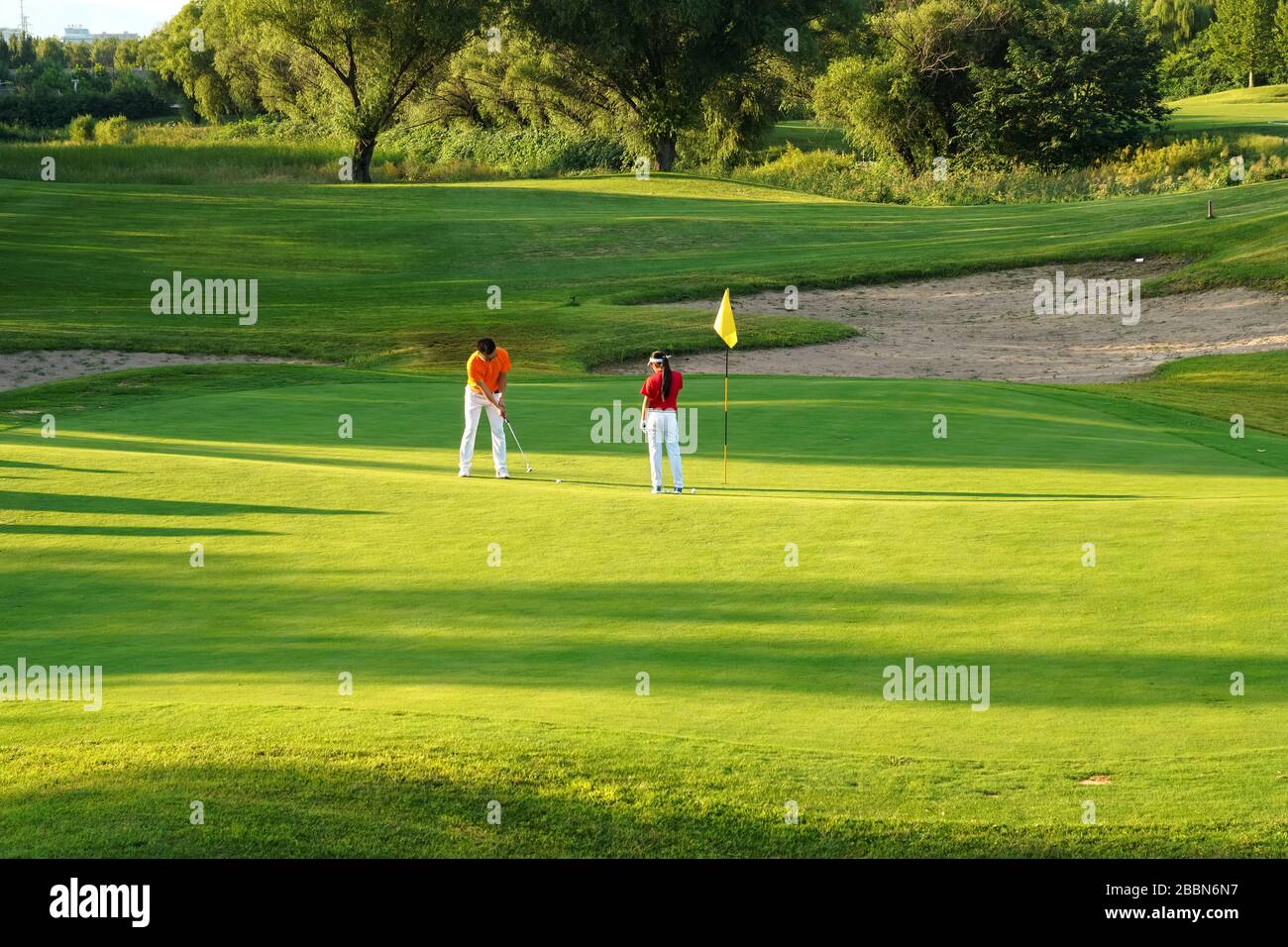Child playing golf hi-res stock photography and images - Alamy