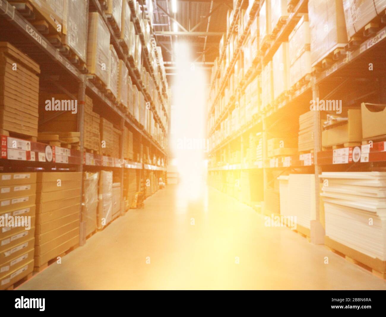 Interior of new large and modern warehouse space. Building materials ...