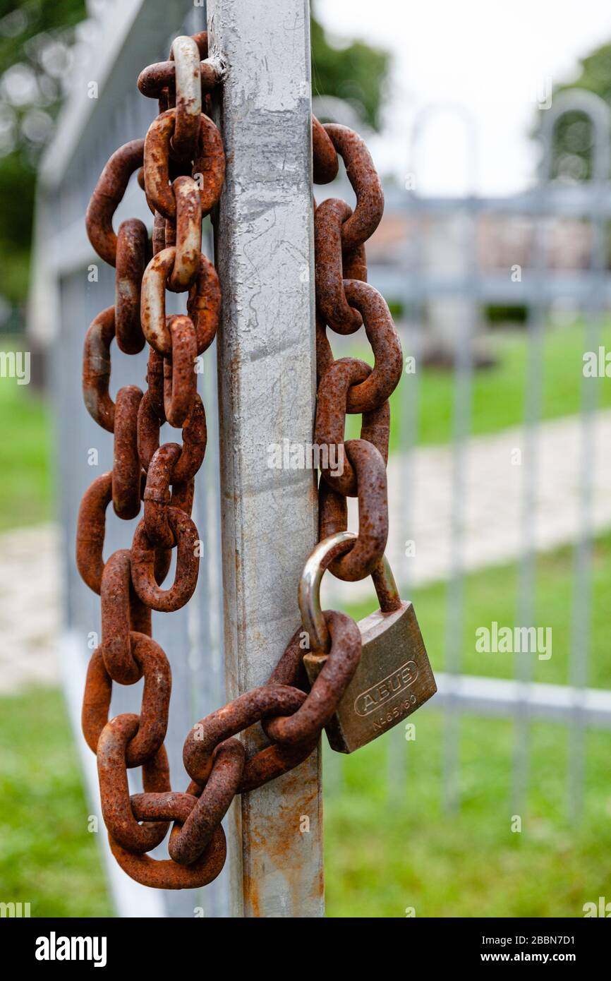 Old rusty chain with a locker Stock Photo - Alamy