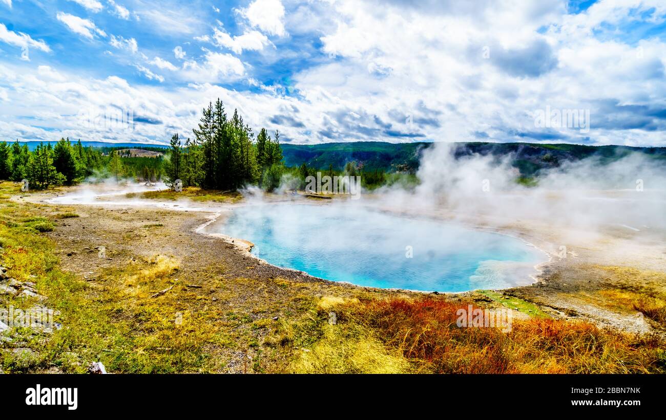 Steam coming from the turquoise waters of the Gem Pool hot spring in ...
