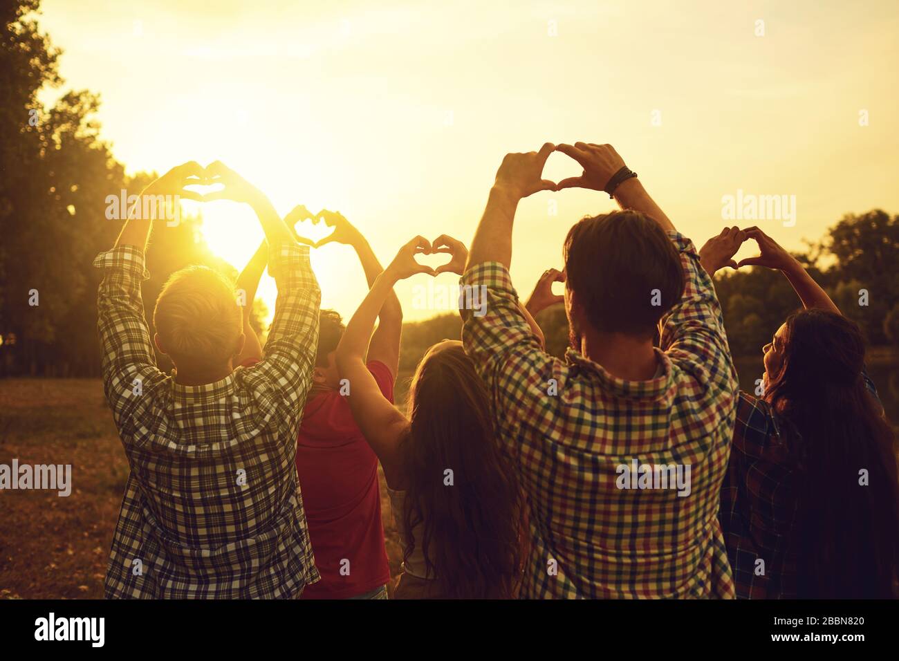 Group of people making heart symbol hi-res stock photography and images ...