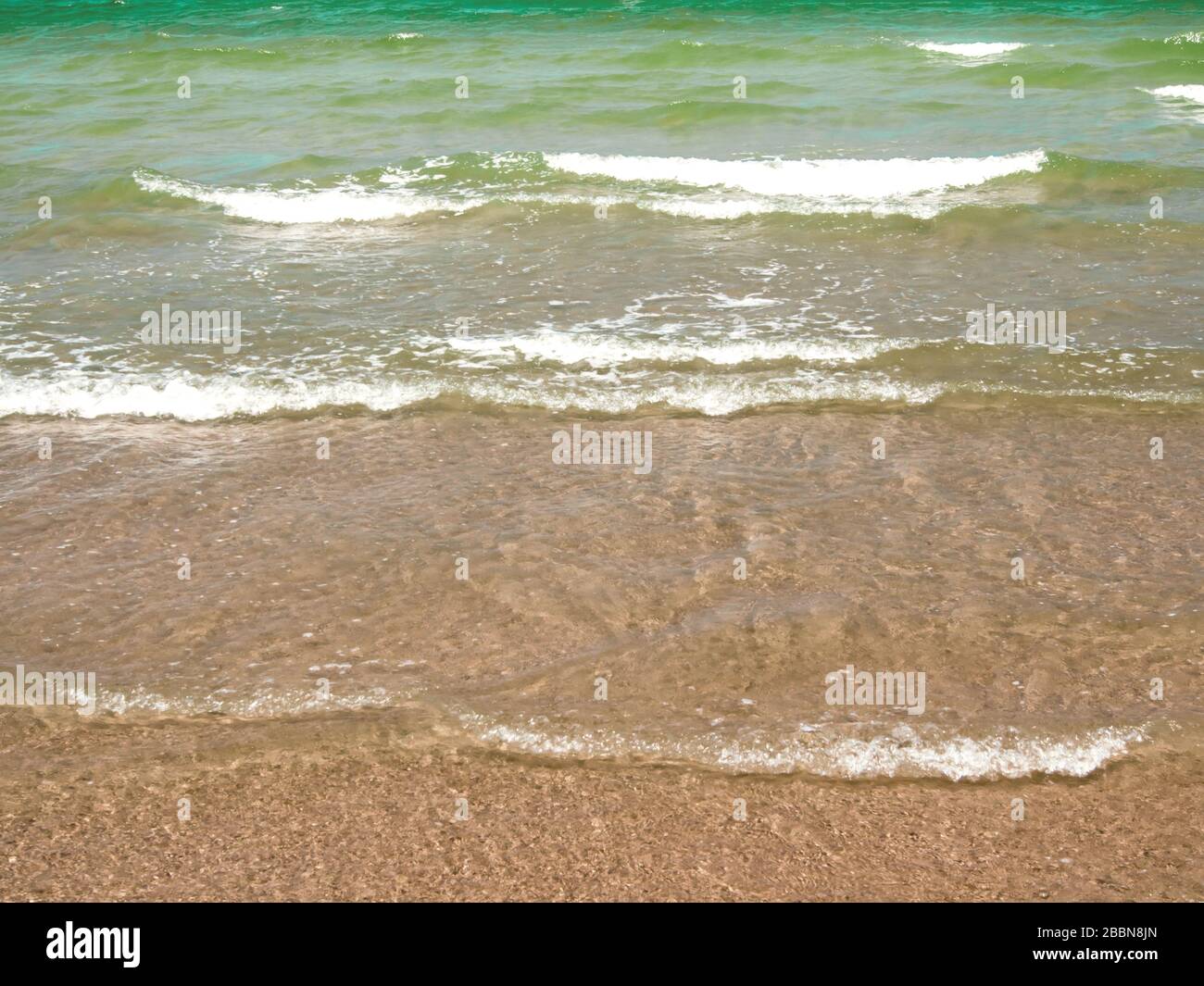 Bubble of Sea wave on the beach Stock Photo - Alamy