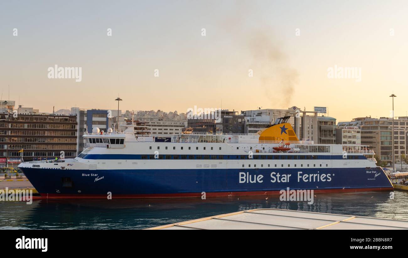 Piraeus, Greece - April 15, 2014. Ferry of Blue Star Ferries docking at ...