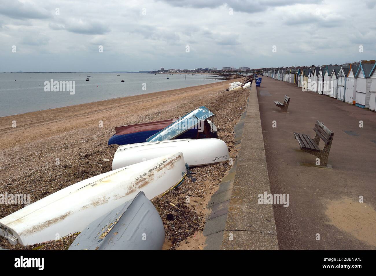 Boats left on a deserted beach on Southend seafront in Essex, as the UK ...