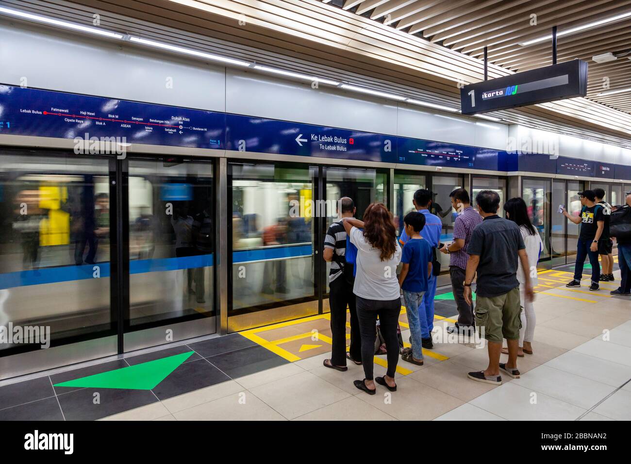 Indonesian People Queue To Board The Metro (MRT), Jakarta, Indonesia ...