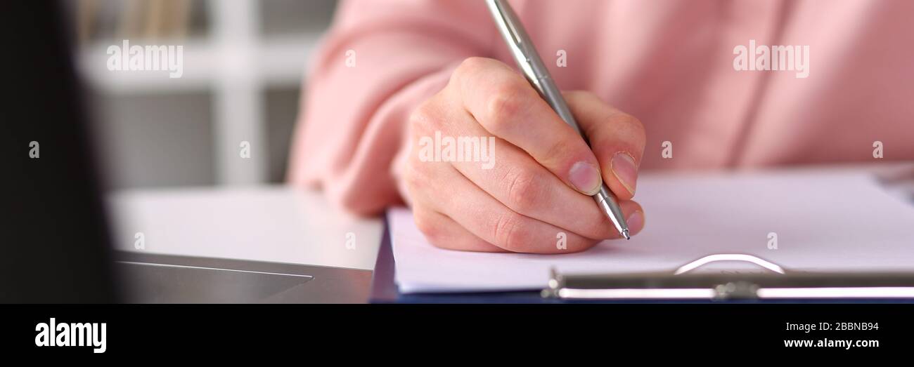 Female hands taking notes hi-res stock photography and images - Alamy