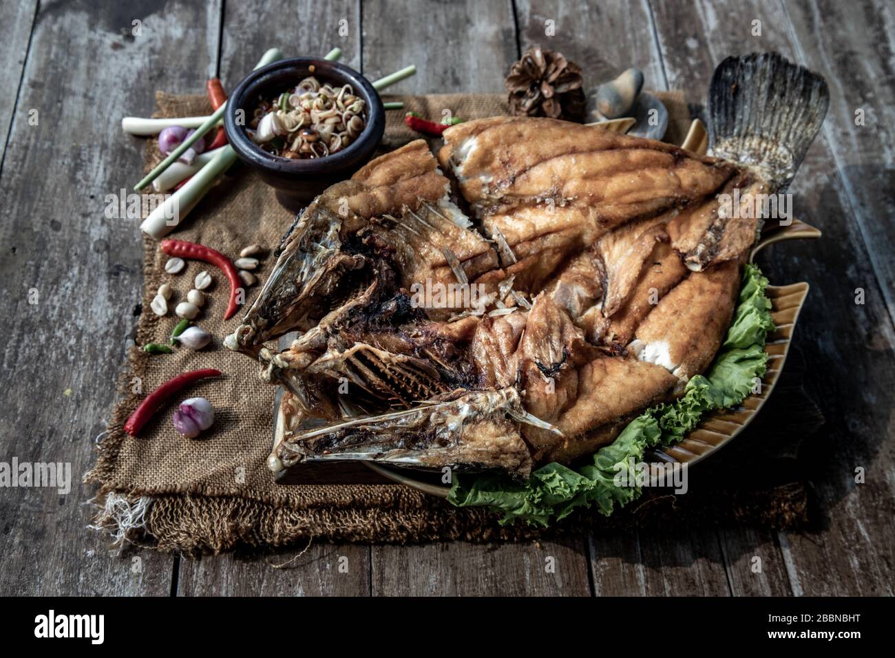Deep fried Snapper with fish sauce on vintage wooden, The perfect ...