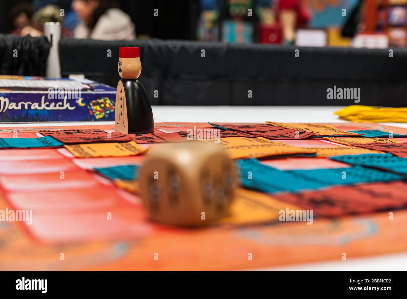 People playing at “Marrakech” at the game and toy fair of Quebec City ...