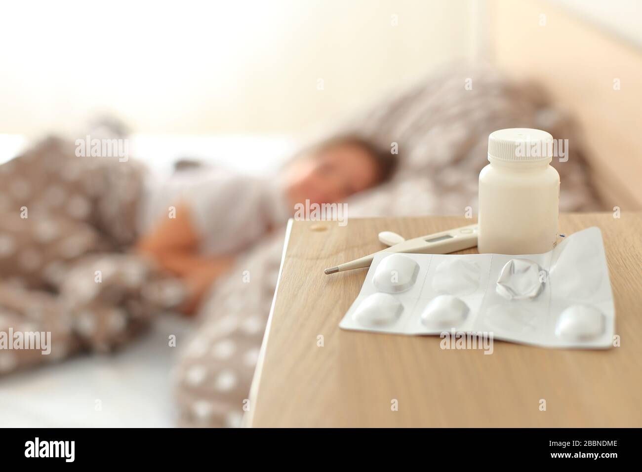 Little girl is sick at home in quarantine Stock Photo - Alamy