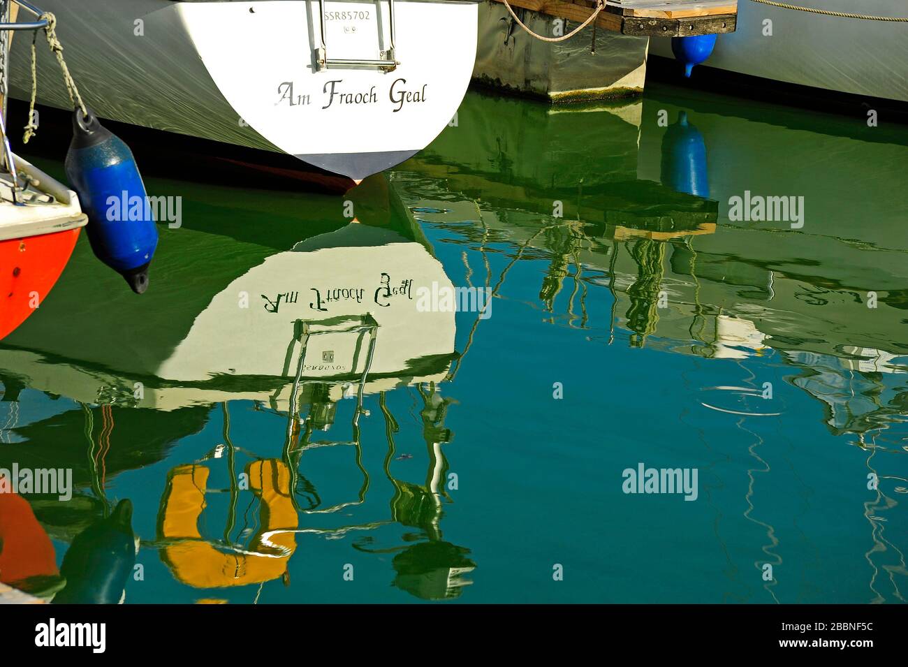 Distorted reflection boat in water hi-res stock photography and images ...