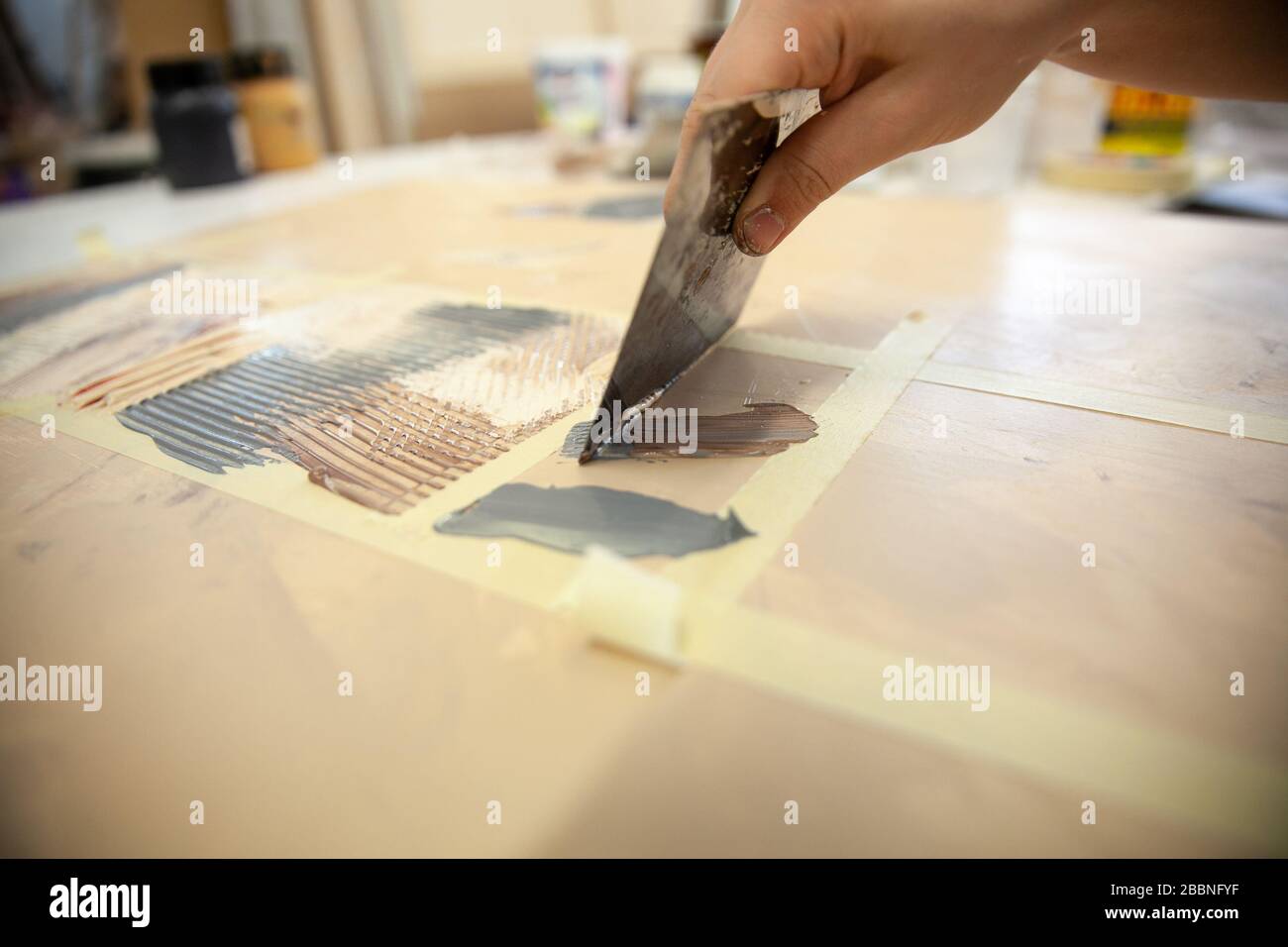 spreading the color on the palette close-up Stock Photo - Alamy