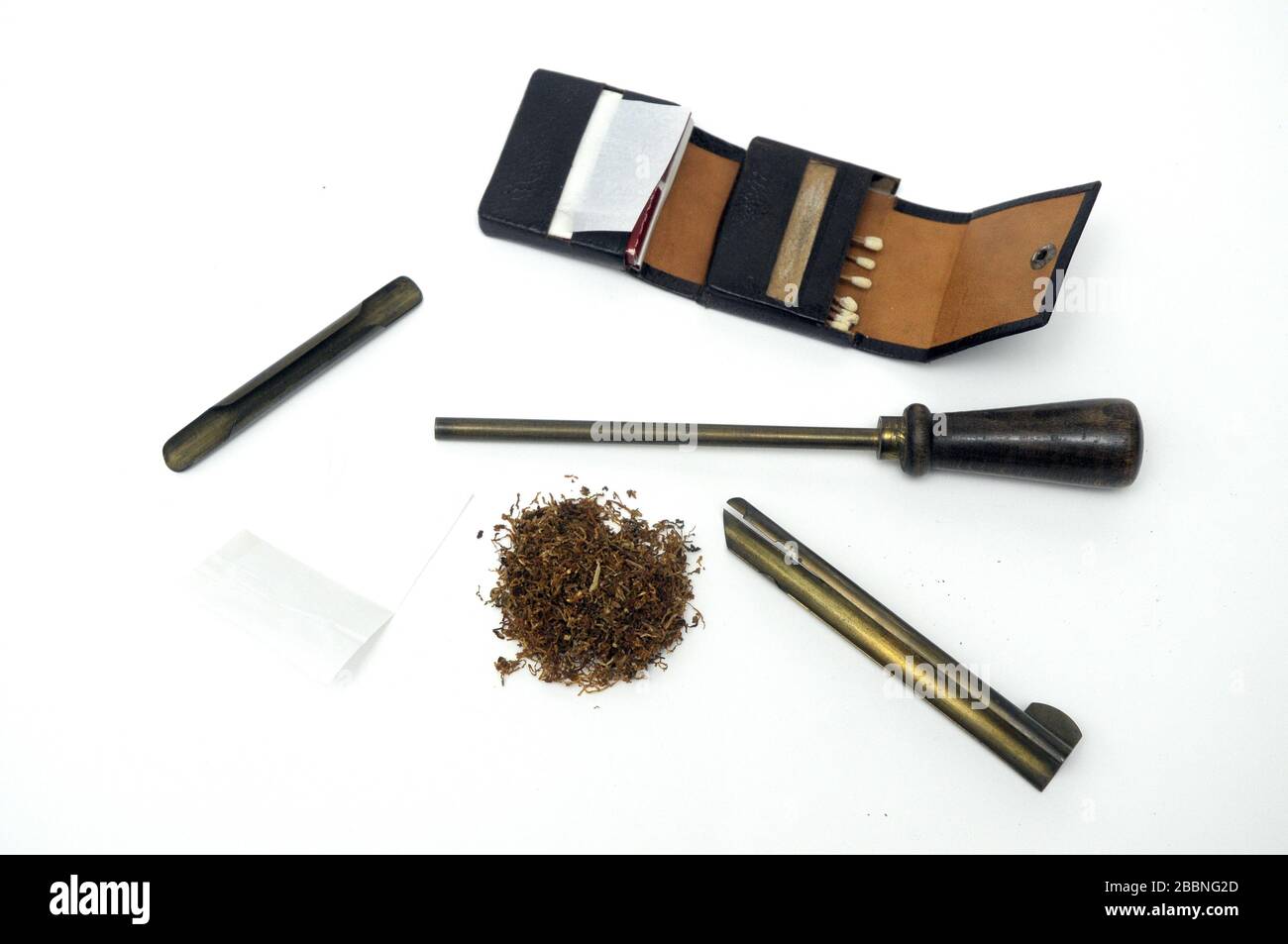 old cigarettes rolling machine Stock Photo - Alamy