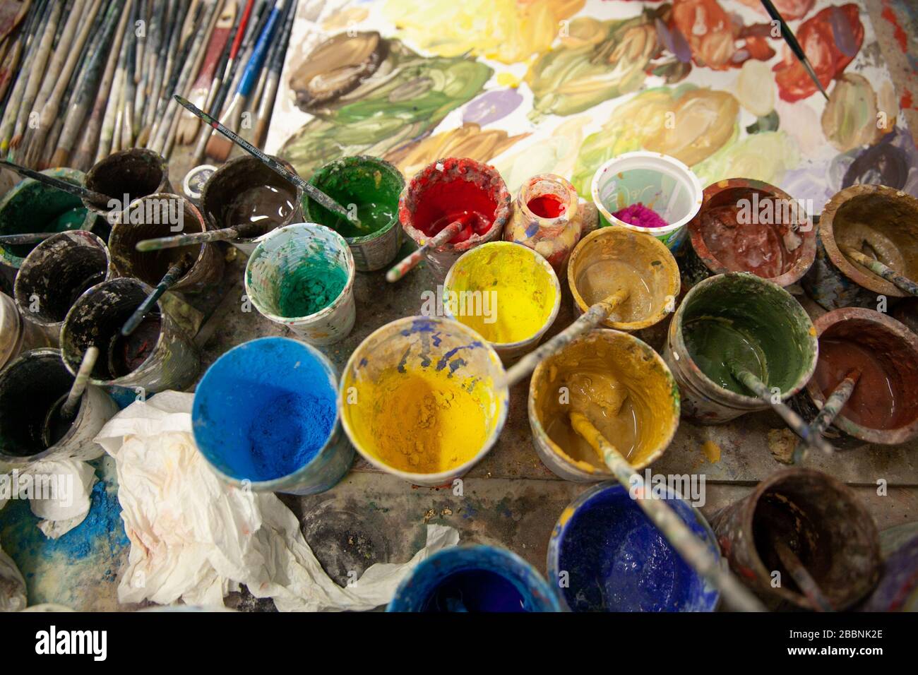 palette of painter colors with brushes Stock Photo - Alamy
