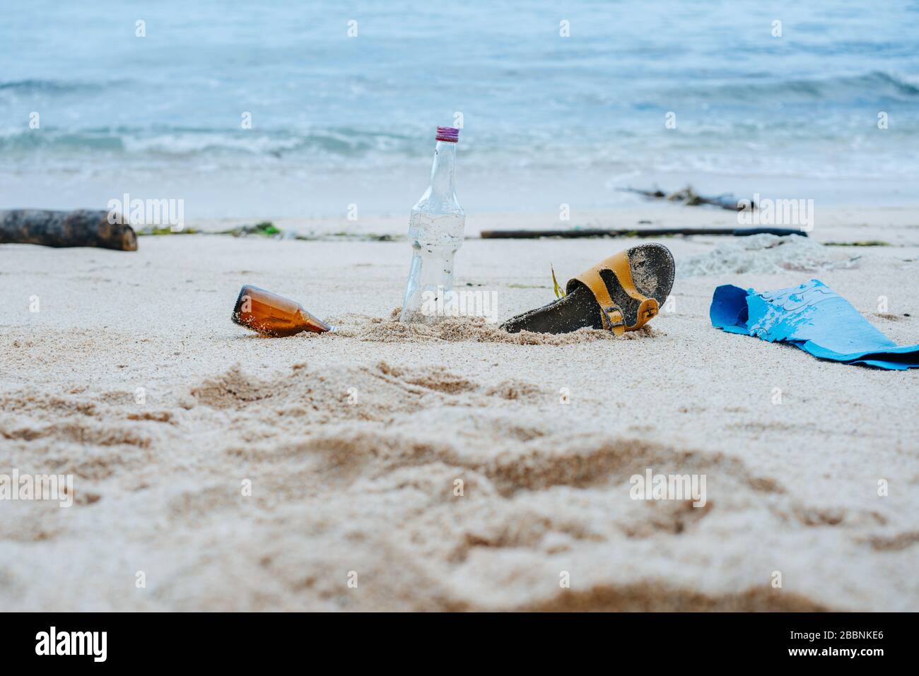 Plastic waste buried in sand hi-res stock photography and images - Alamy