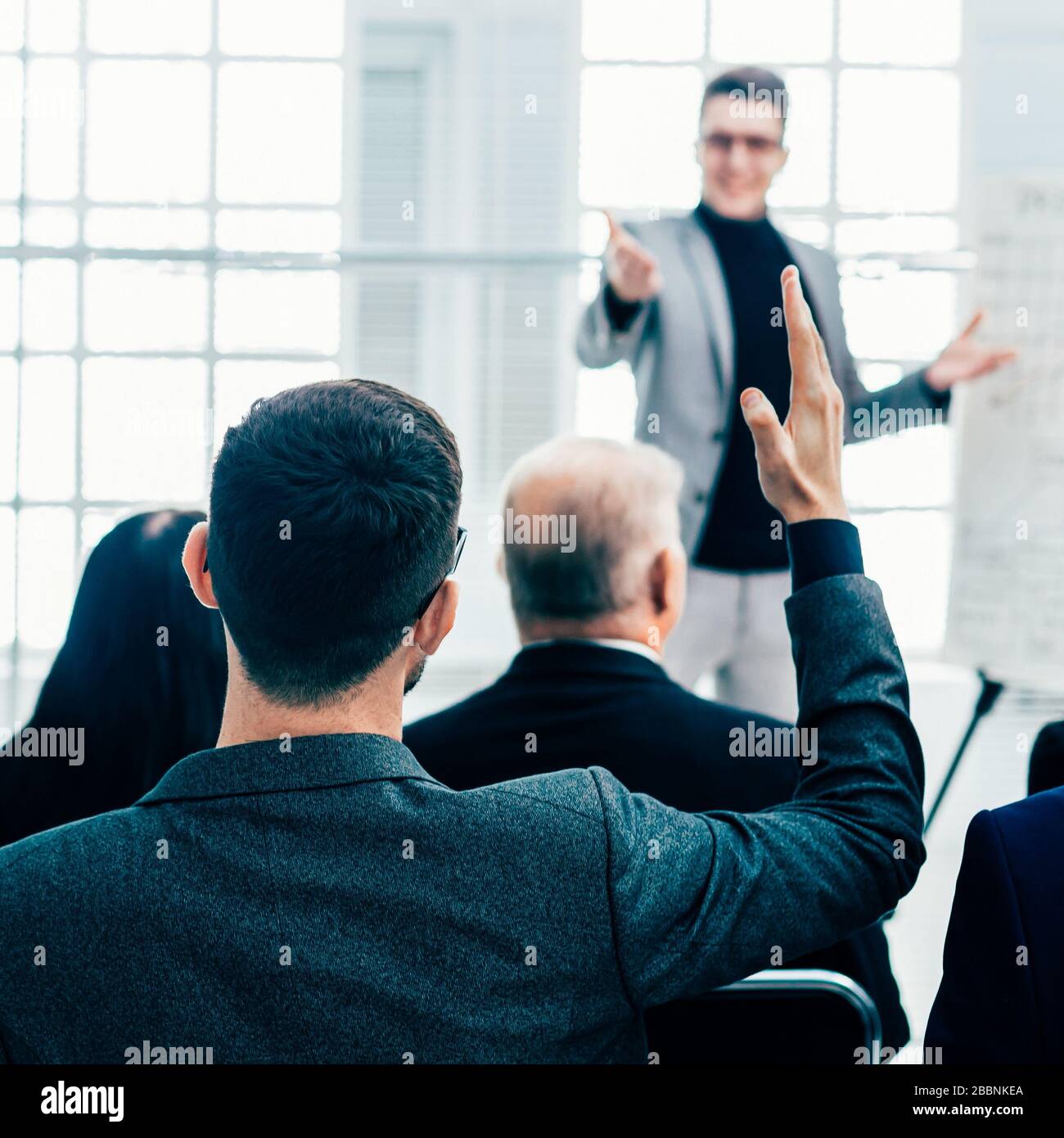 speaker asks questions during the business seminar Stock Photo - Alamy