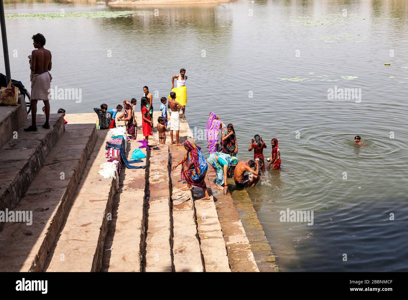 Washing and Bathing in the Ganges River near Varanasi in India Stock ...
