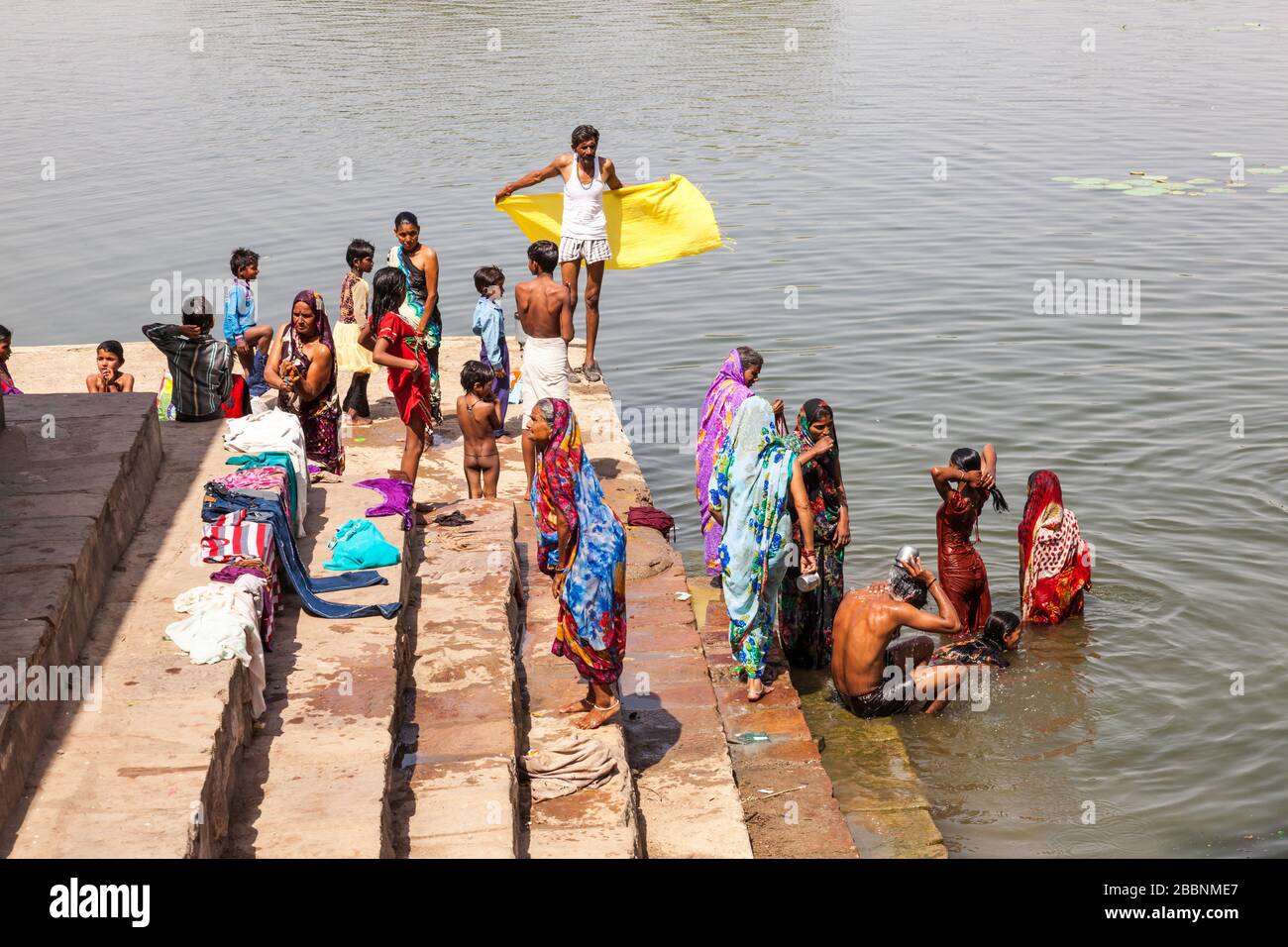 Washing and Bathing in the Ganges River near Varanasi in India Stock ...