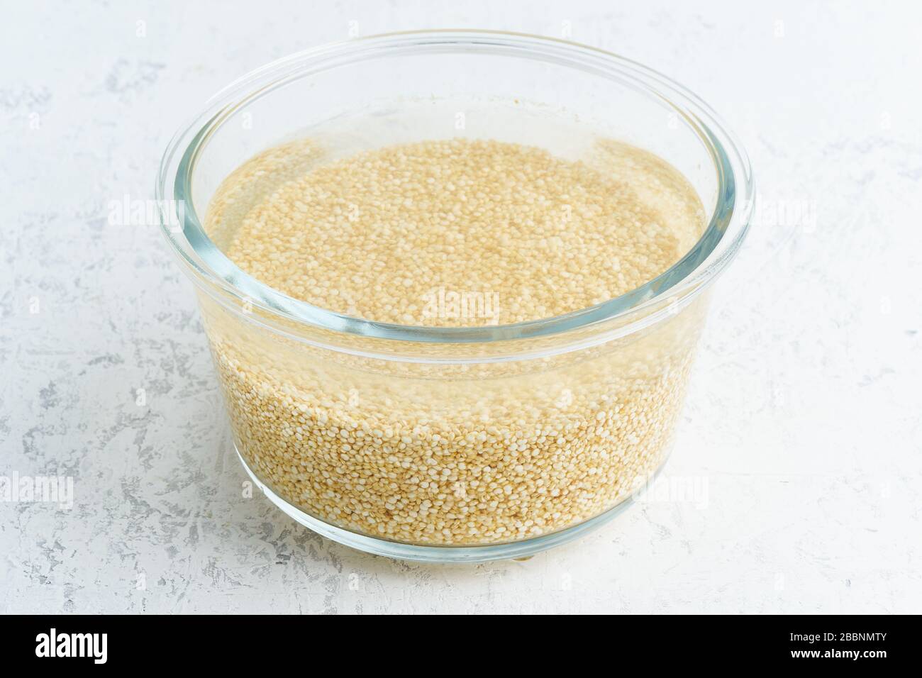Soaking quinoa cereal in water to ferment cereals and neutralize phytic ...
