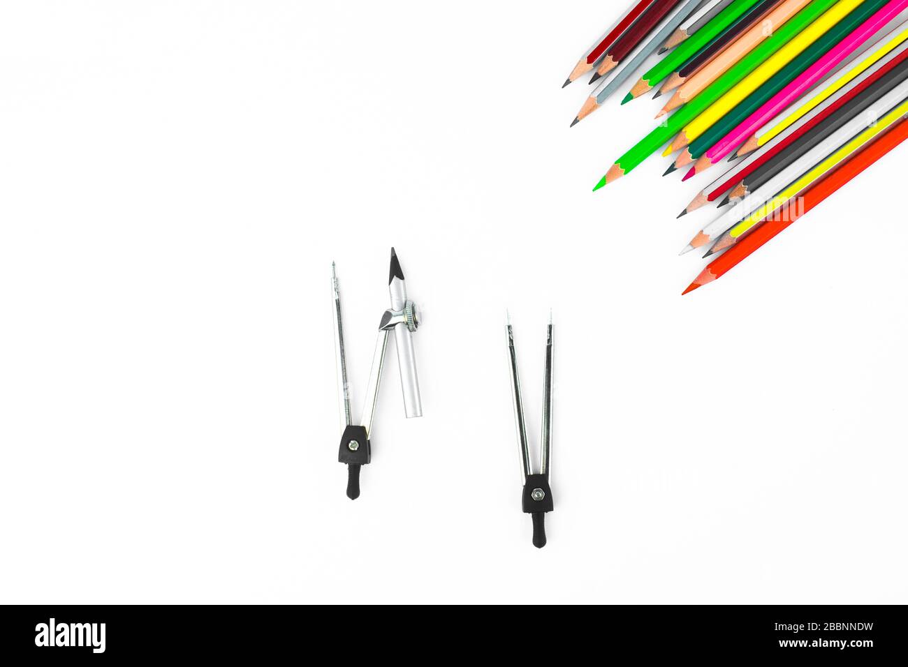 A row of different colored pencil crayons pointing at two pencil ...