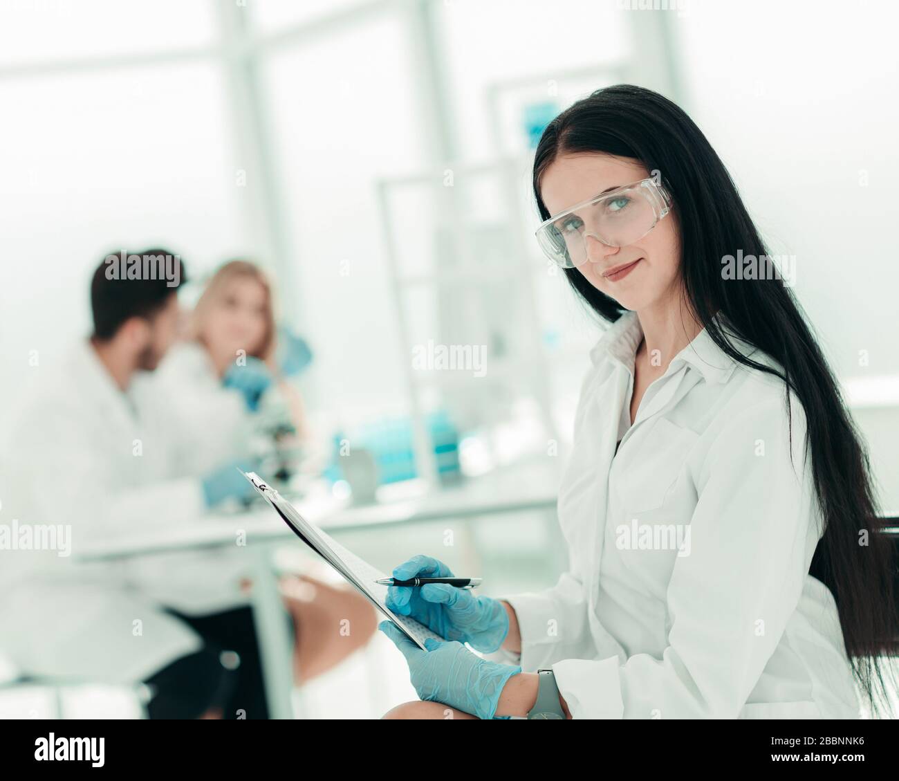 Woman reading science journal hi-res stock photography and images - Alamy