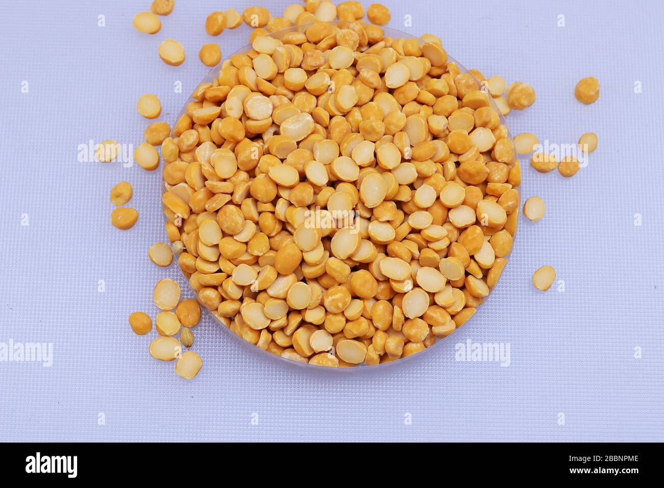 Yellow color split raw Chana dal or chickpeas lentils Stock Photo - Alamy