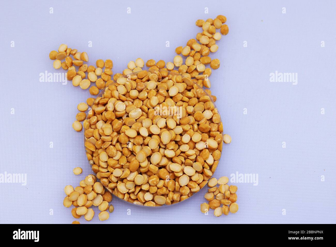 Yellow color split raw Chana dal or chickpeas lentils Stock Photo - Alamy