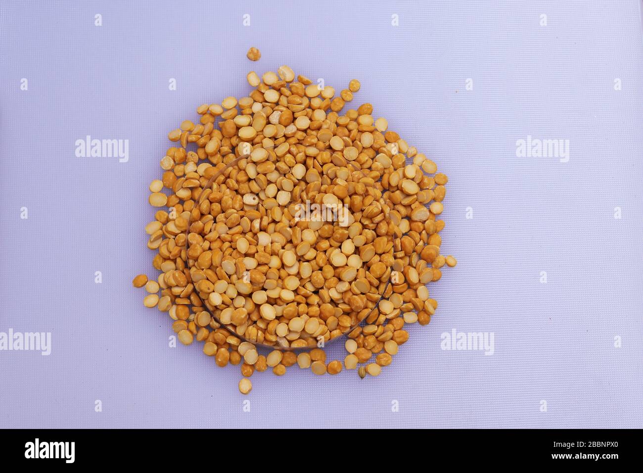 Yellow color split raw Chana dal or chickpeas lentils Stock Photo - Alamy