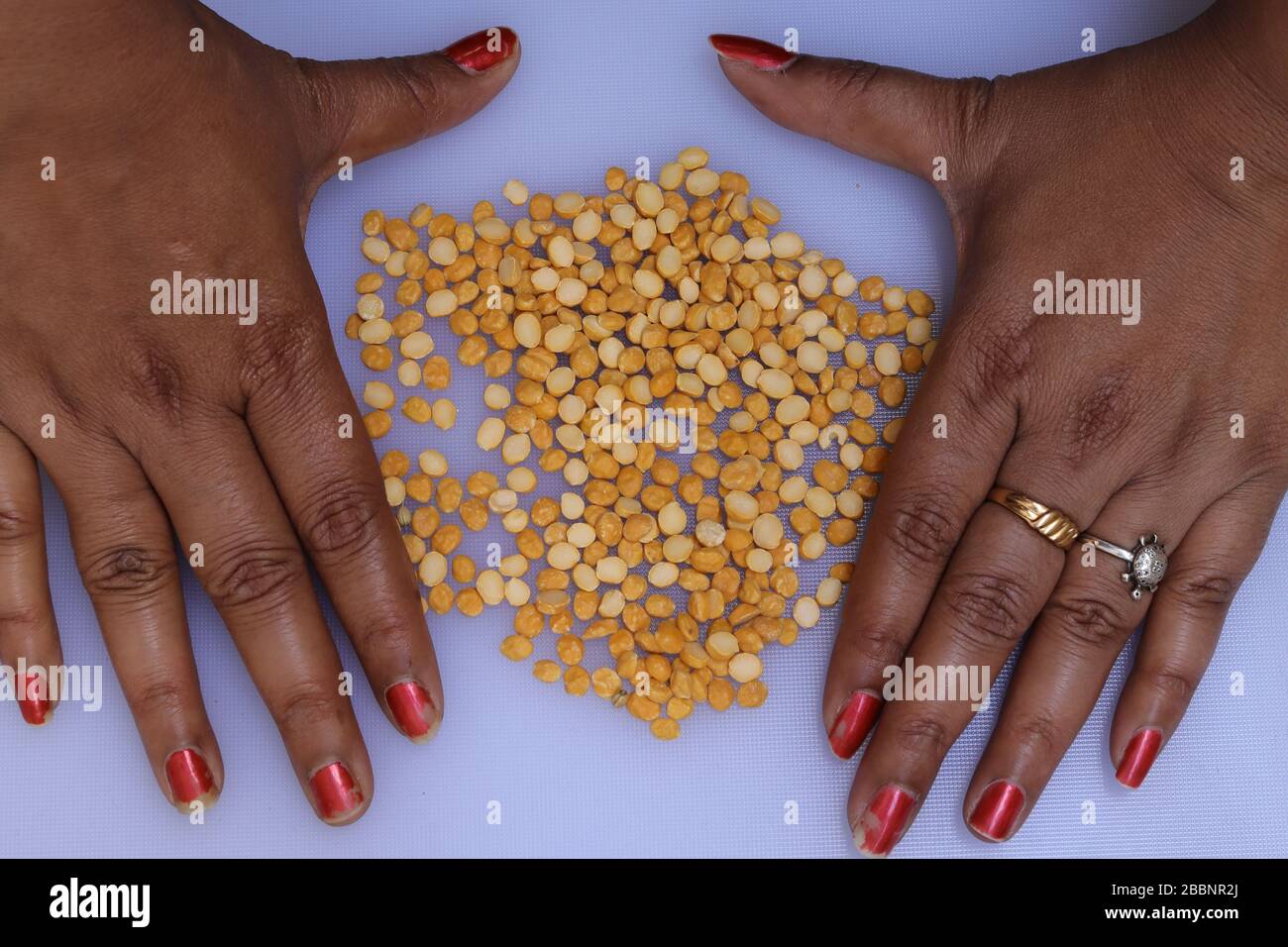 Yellow color split raw Chana dal or chickpeas lentils Stock Photo - Alamy