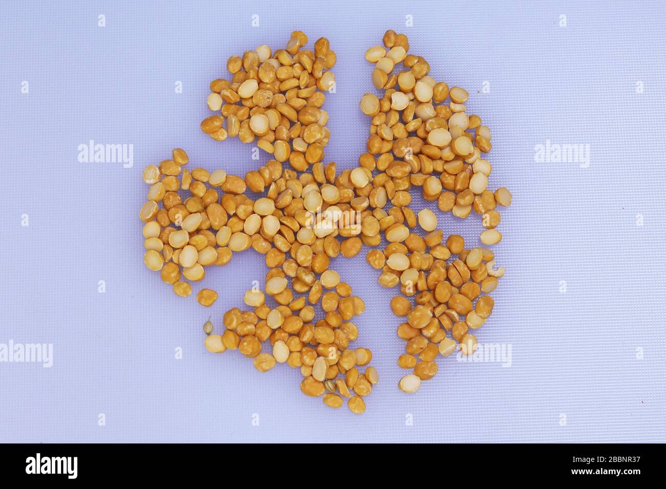 Yellow color split raw Chana dal or chickpeas lentils Stock Photo - Alamy