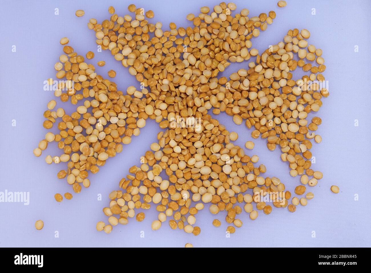 Yellow color split raw Chana dal or chickpeas lentils Stock Photo - Alamy