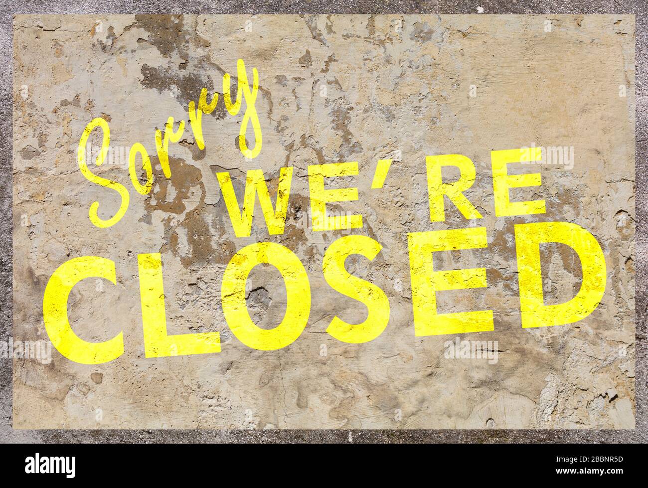 Closed sign. Yellow color text Sorry we re closed on beige marble stone ...
