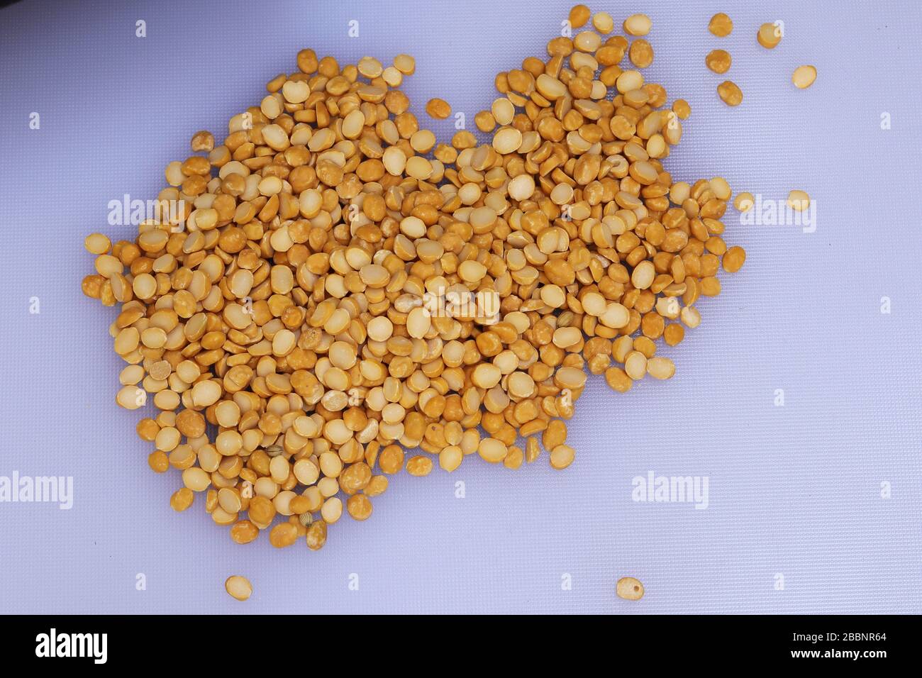 Yellow color split raw Chana dal or chickpeas lentils Stock Photo - Alamy