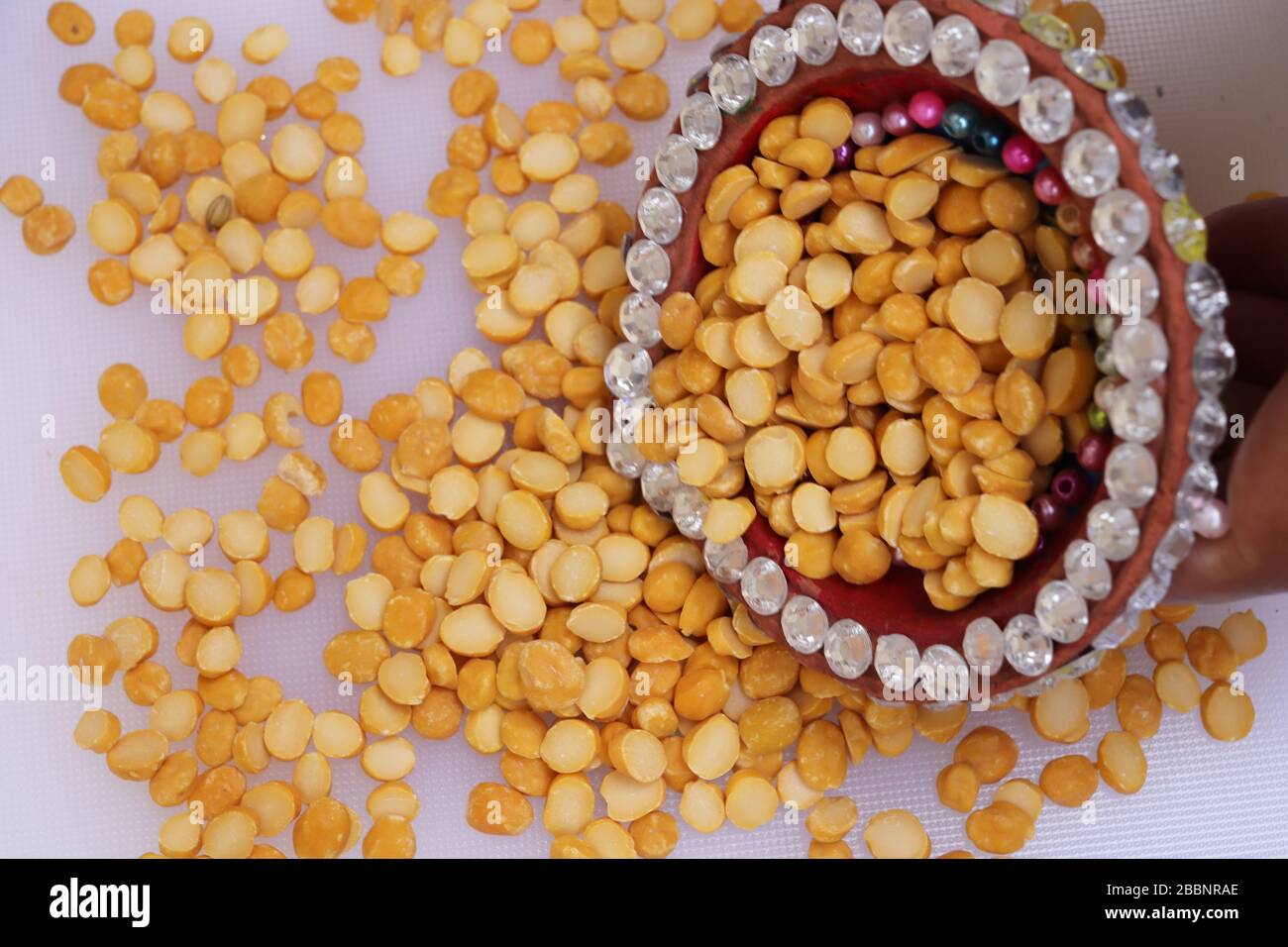 Yellow color split raw Chana dal or chickpeas lentils Stock Photo - Alamy