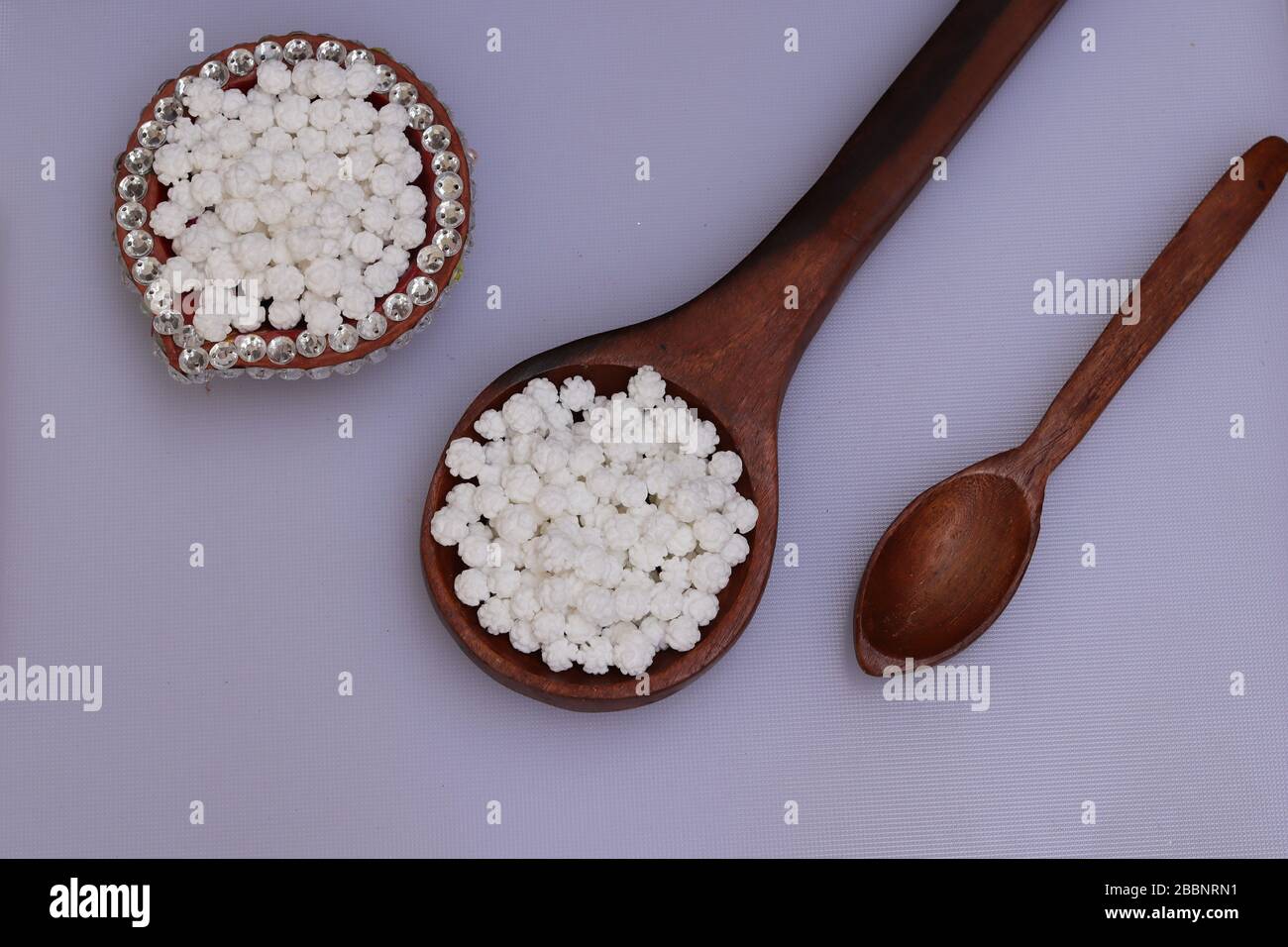 Nakul dana, sweet that made by sugar use as prasad in india Stock Photo ...