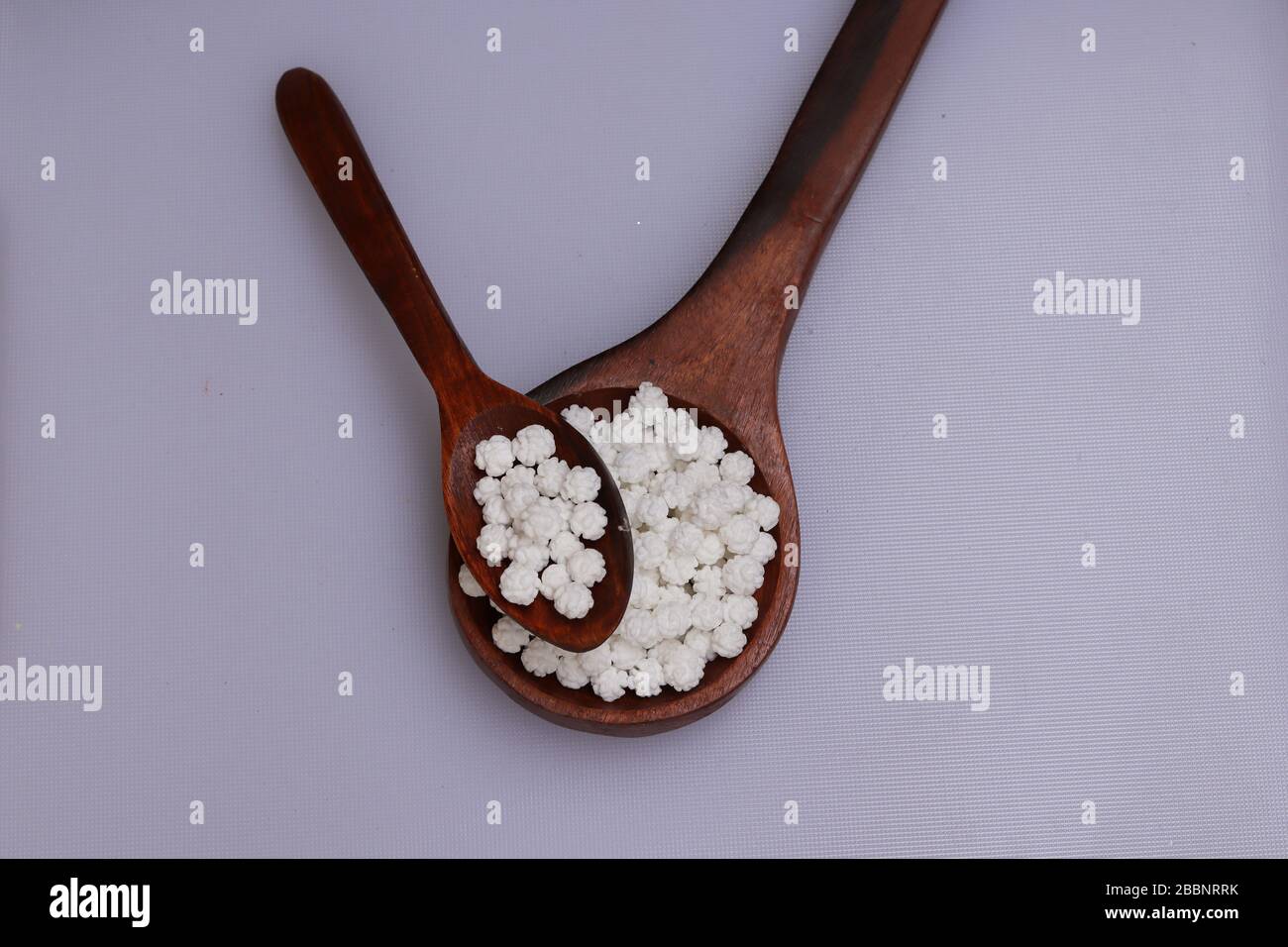 Nakul dana, sweet that made by sugar use as prasad in india Stock Photo ...