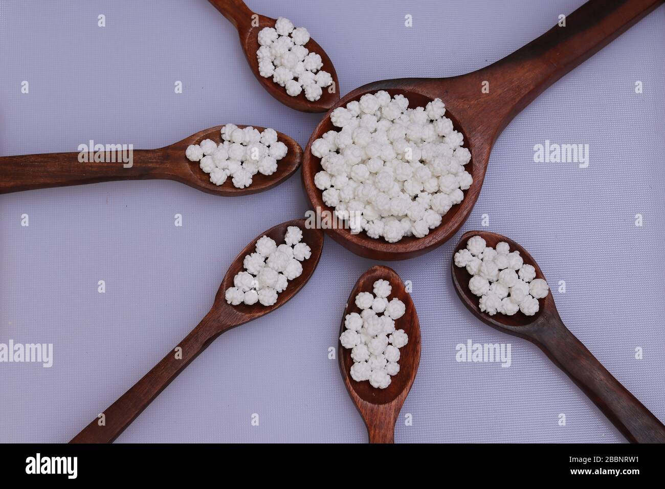 Nakul dana, sweet that made by sugar use as prasad in india Stock Photo ...