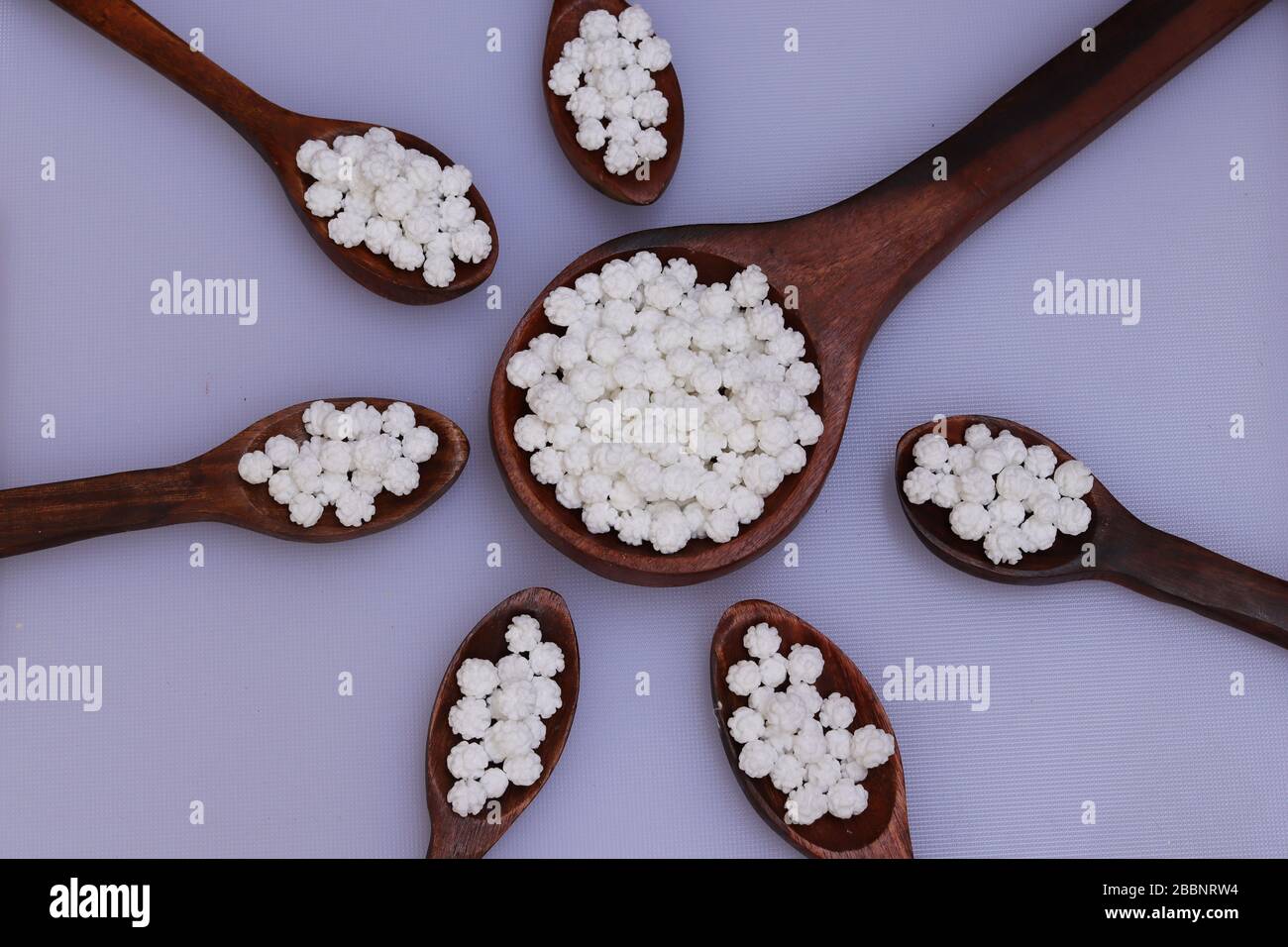 Nakul dana, sweet that made by sugar use as prasad in india Stock Photo ...
