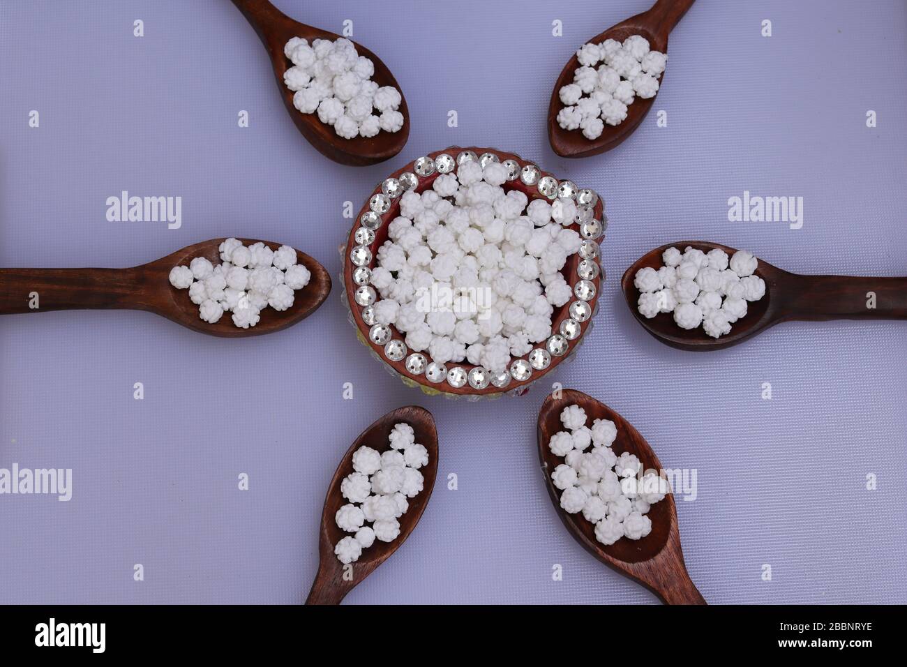 Nakul dana, sweet that made by sugar use as prasad in india Stock Photo ...