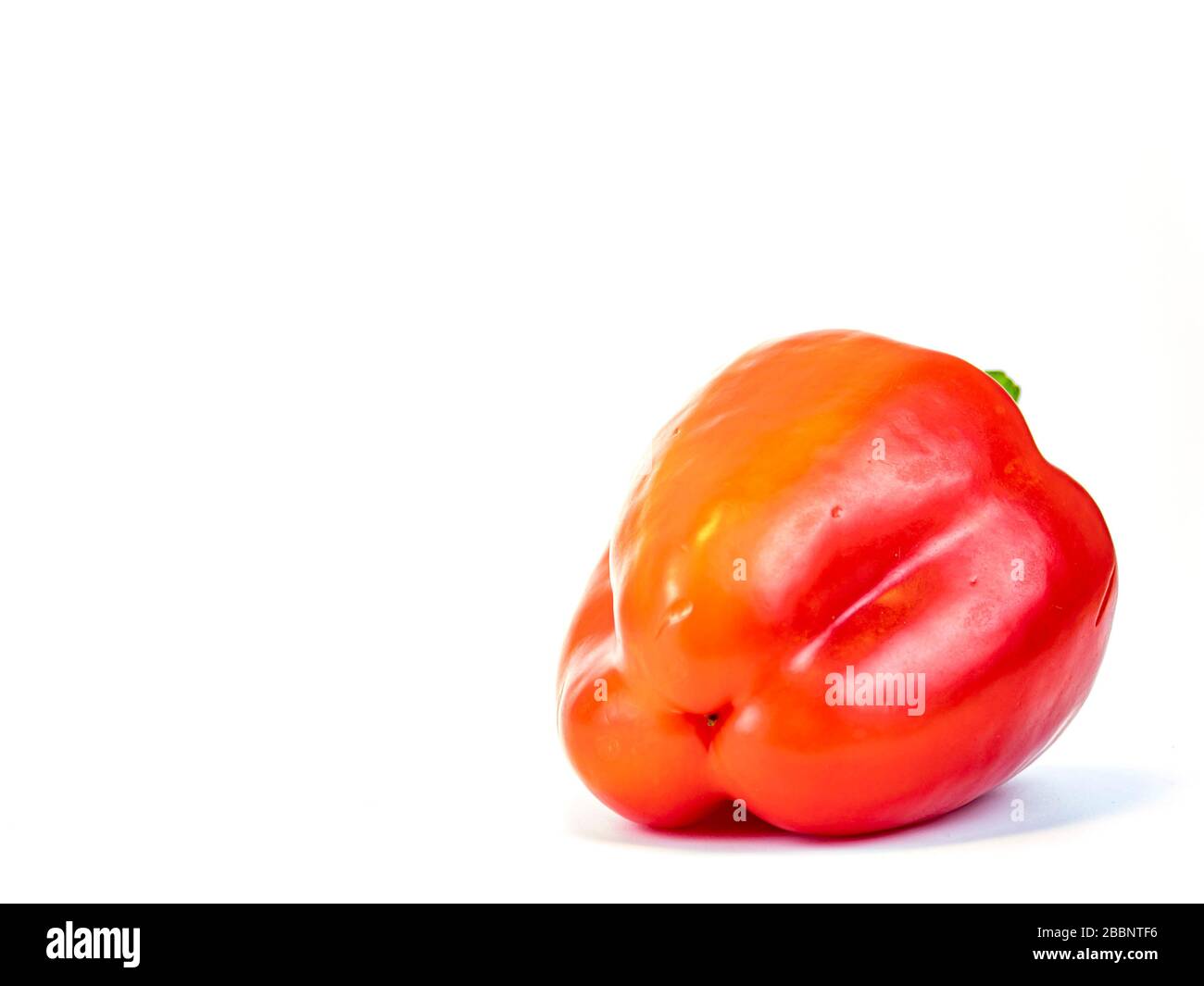Fruit vegetable red bell pepper on a white background Stock Photo - Alamy