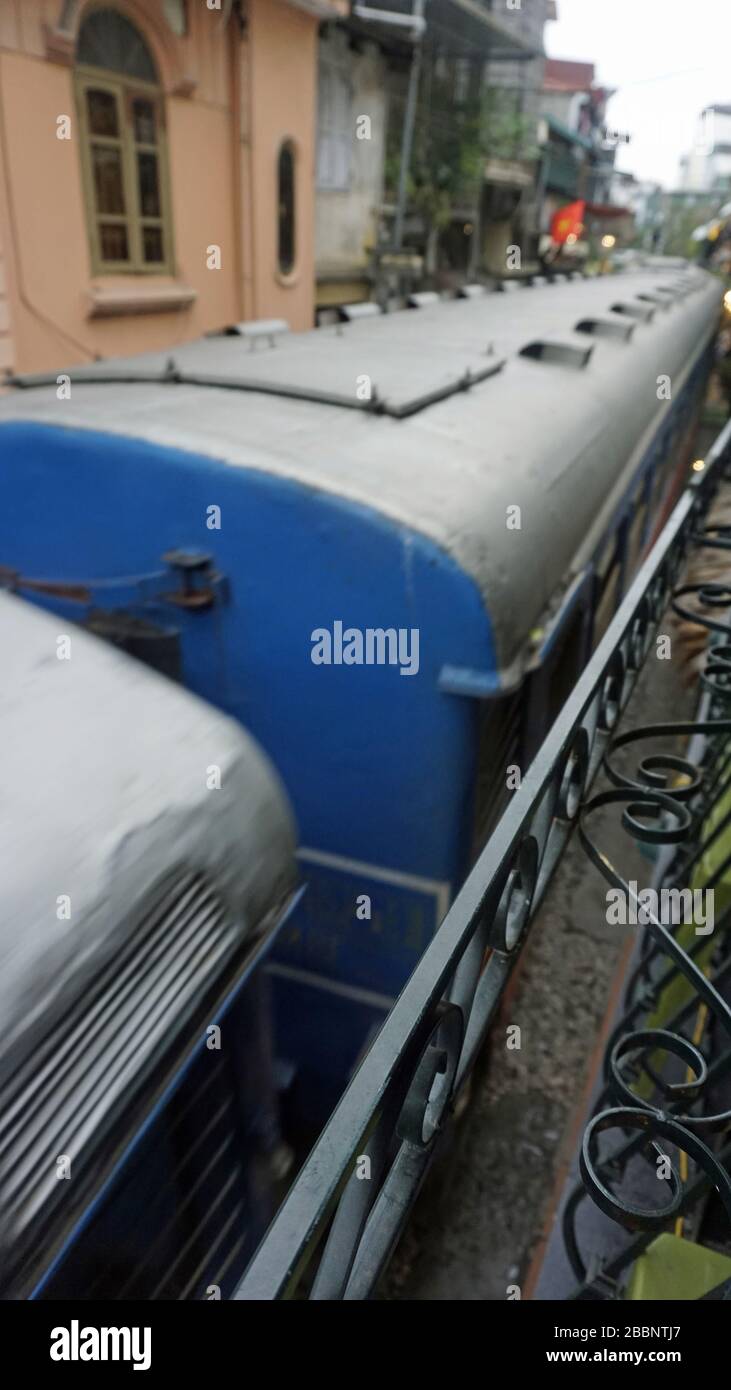 train crossing famous train street in hanoi vietnam Stock Photo - Alamy