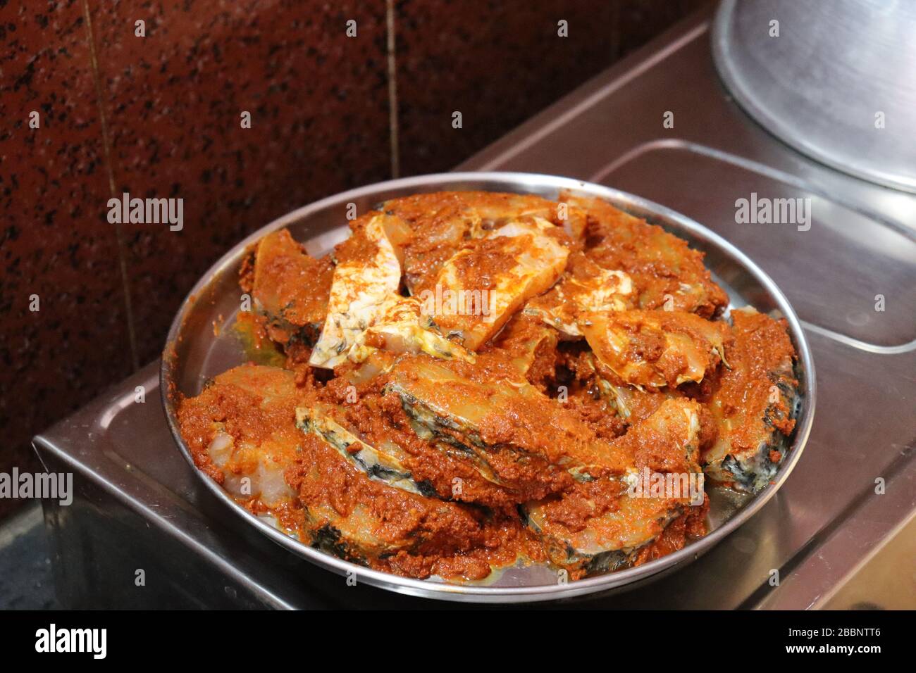Raw Fish fry prepared in south Indian style Stock Photo - Alamy