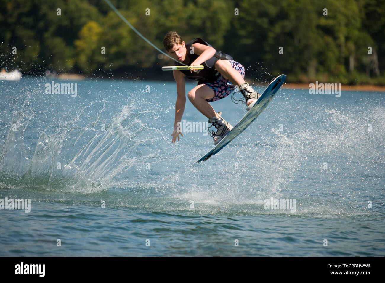 Wakeboarding teenager hi-res stock photography and images - Alamy