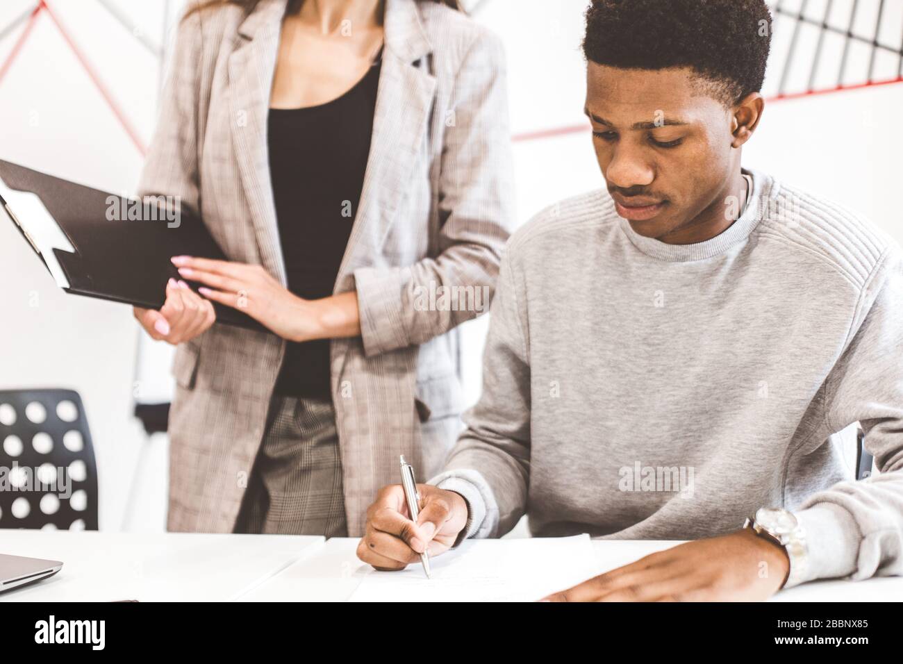 African american man signing contract, black man hand putting signature ...
