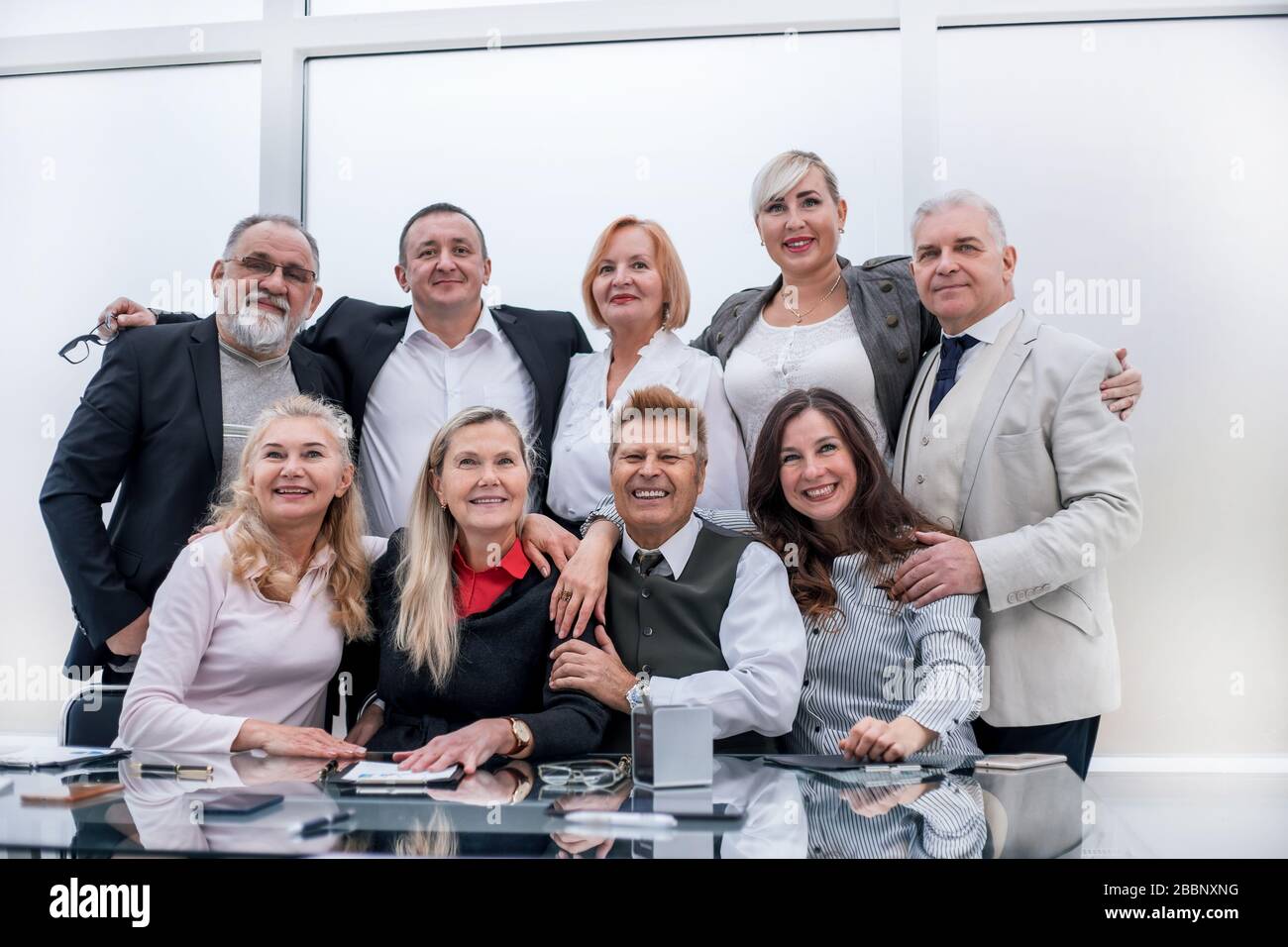 successful business team in the workplace in the office Stock Photo - Alamy