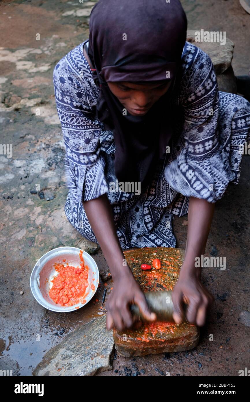 Woman grind spice hi-res stock photography and images - Alamy