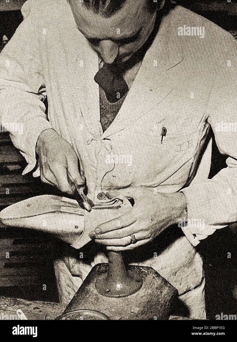1930s shoemaker hi-res stock photography and images - Alamy