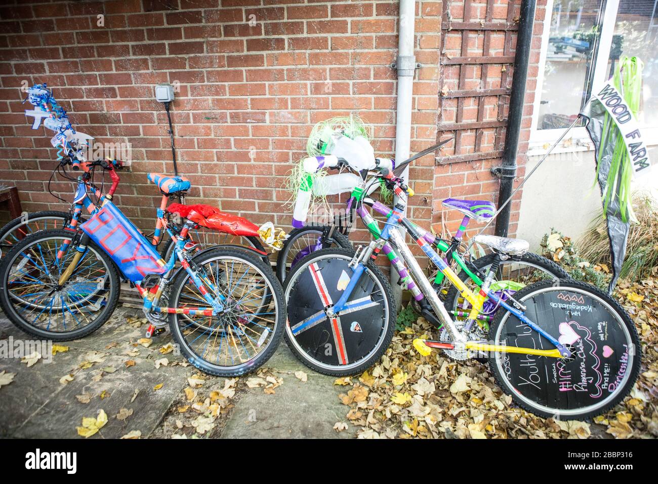 Group of colourful bicycles lined up together Stock Photo - Alamy