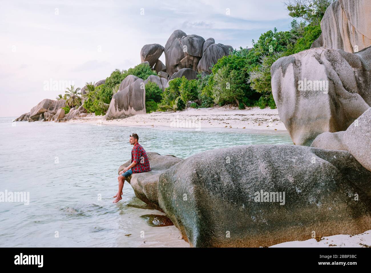 La Digue Seychelles, young men on vacation at the tropical Island La ...