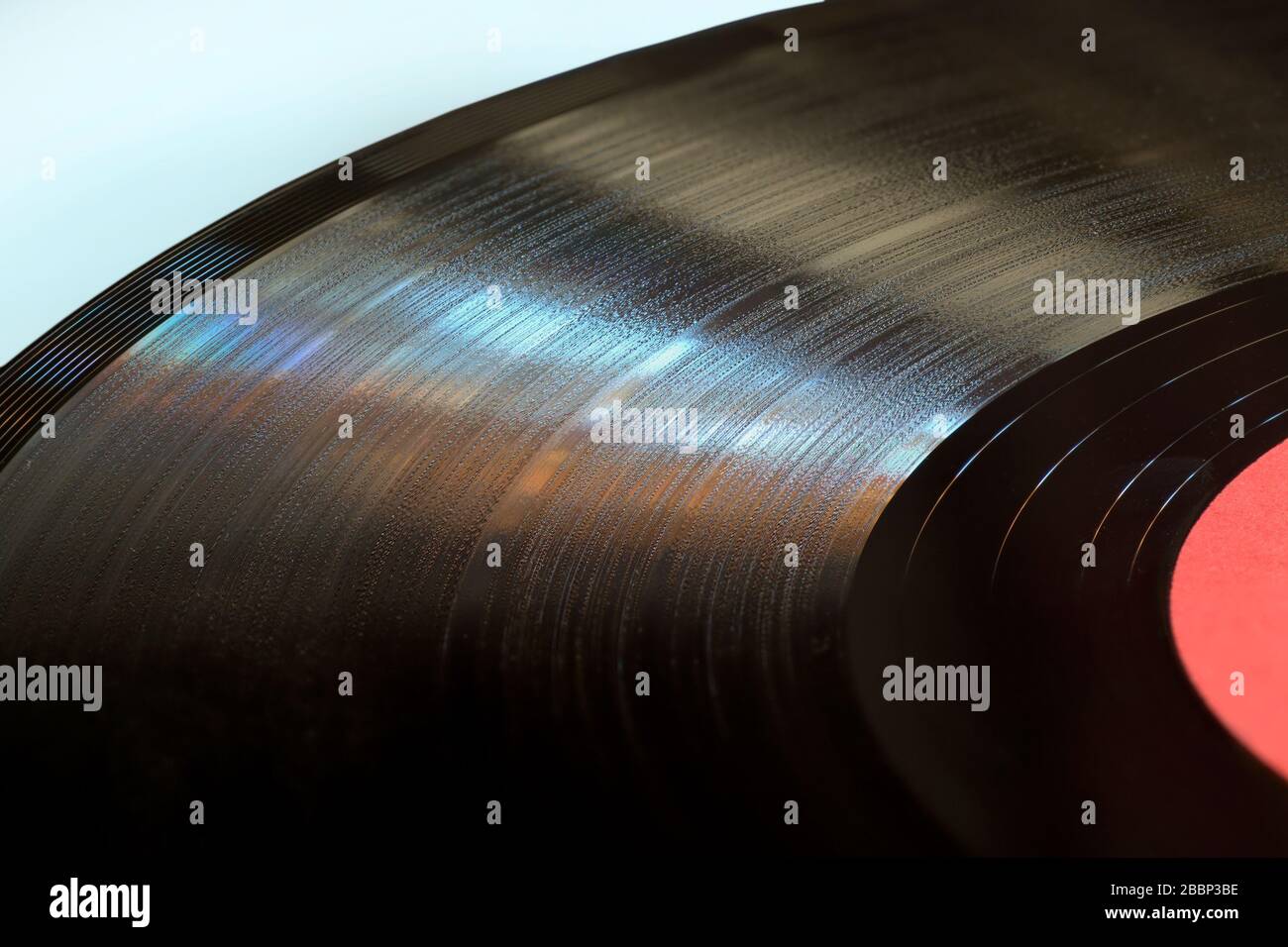 Segment of vinyl record with label close up Stock Photo - Alamy
